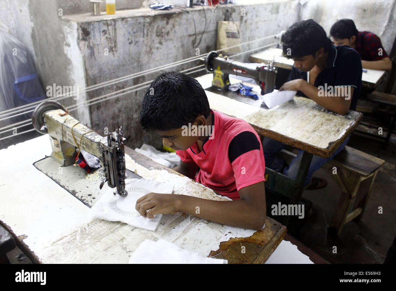 Dhaka, Bangladesh. 22nd July, 2014. Worker making Islamic Tupi (cap) in ...