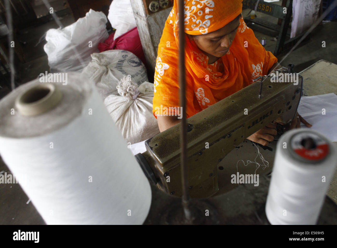 Dhaka, Bangladesh. 22nd July, 2014. Worker making Islamic Tupi (cap) in ...