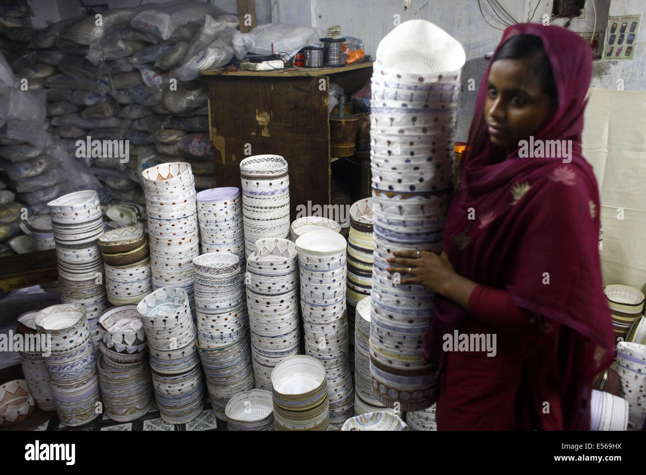 Dhaka, Bangladesh. 22nd July, 2014. Worker making Islamic Tupi (cap) in ...