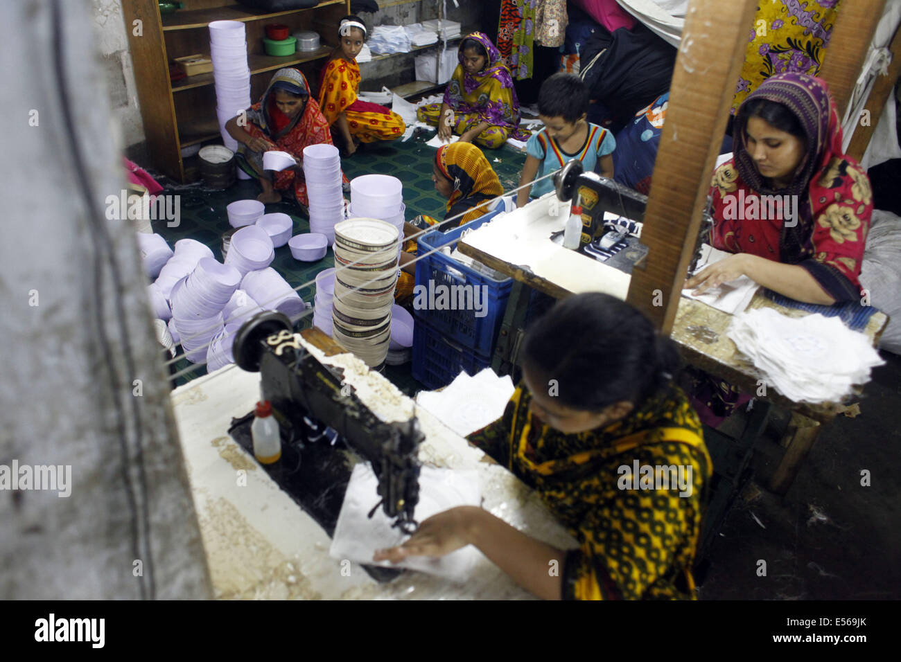 Dhaka, Bangladesh. 22nd July, 2014. Worker making Islamic Tupi (cap) in ...