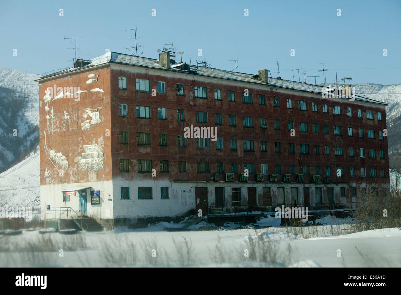 Large Russian block of flats snow mountains Stock Photo - Alamy