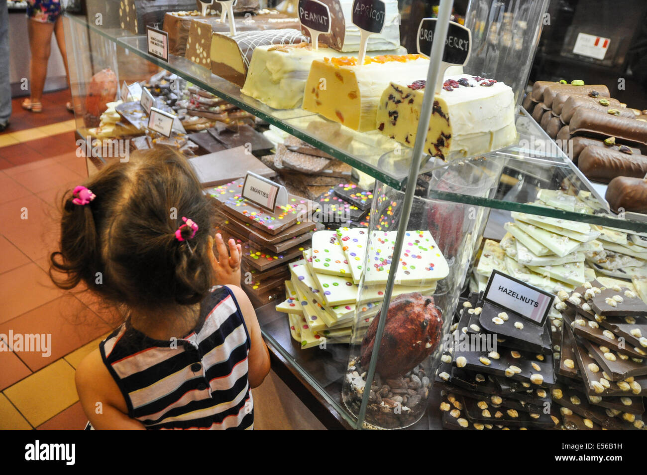 Young girl in a candy store. Photographed in Prague Czech Republic ...