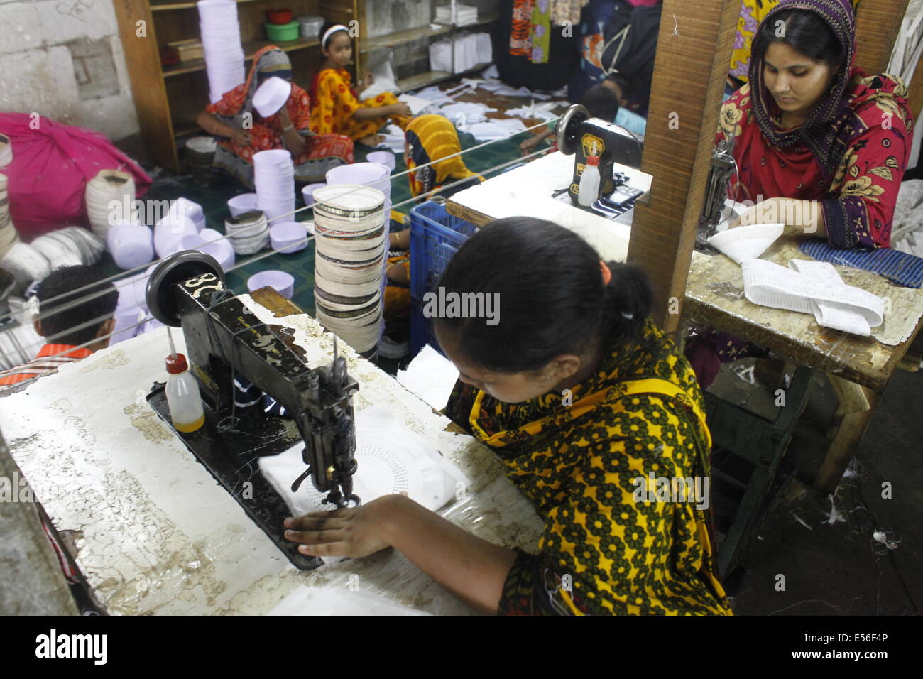 Worker making Islamic Tupi (cap) in a factory in Bangladesh on the ...