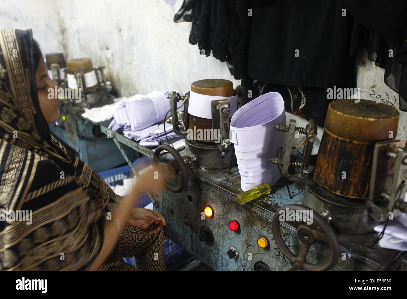 Worker making Islamic Tupi (cap) in a factory in Bangladesh on the ...