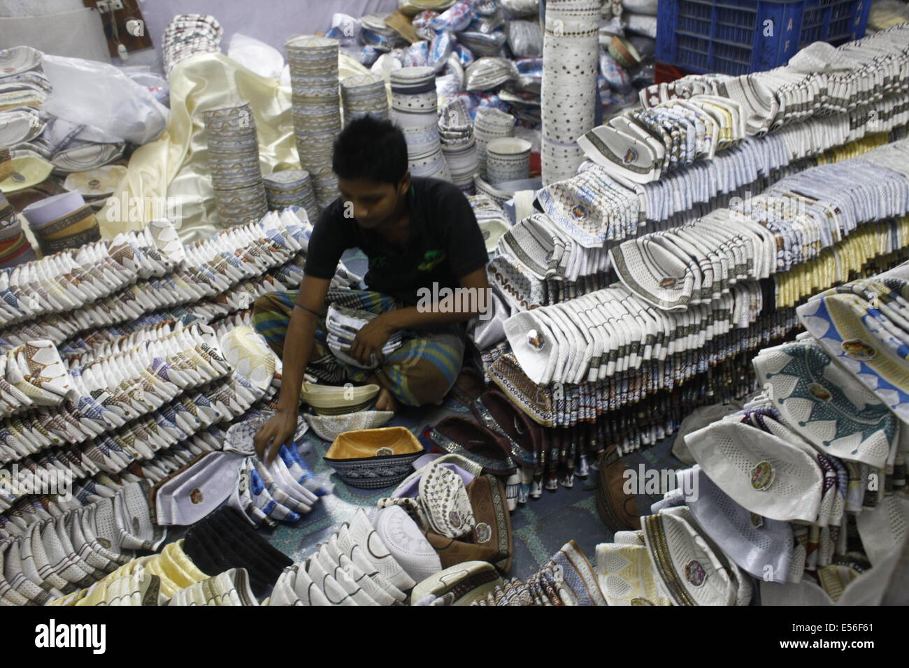 Worker making Islamic Tupi (cap) in a factory in Bangladesh on the ...