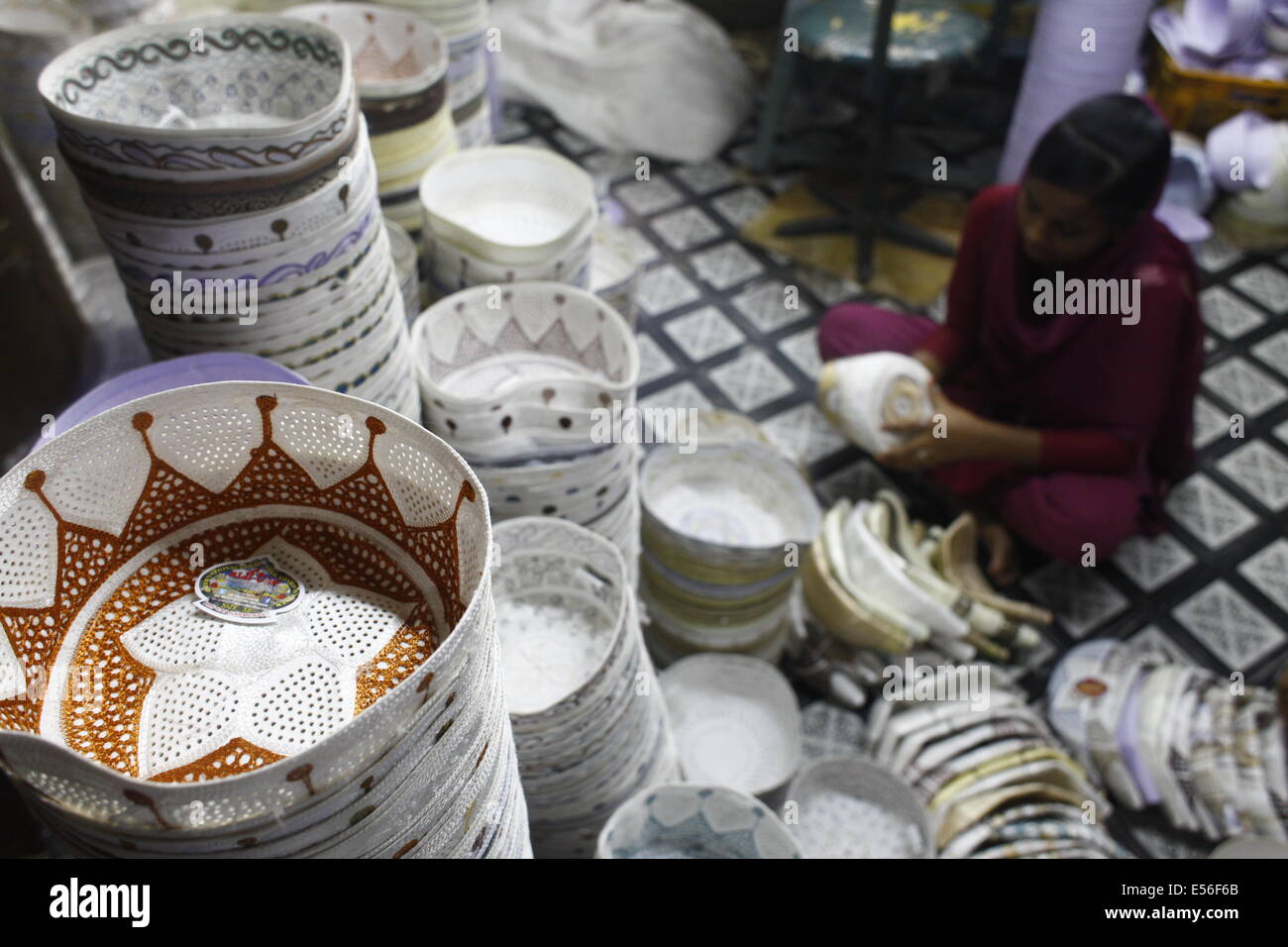 Worker making Islamic Tupi (cap) in a factory in Bangladesh on the ...
