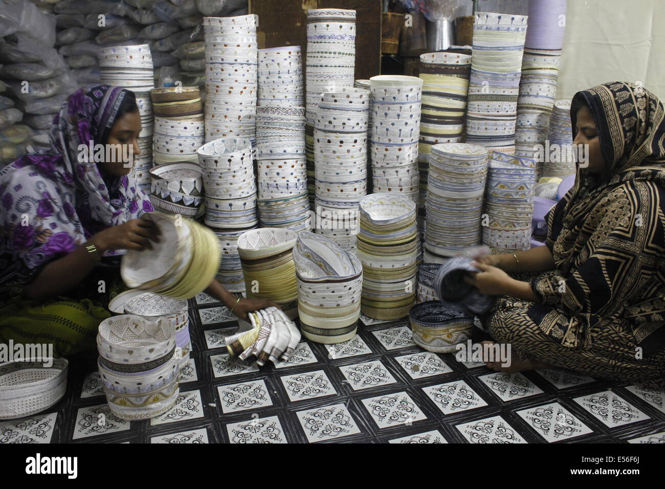 Worker making Islamic Tupi (cap) in a factory in Bangladesh on the ...