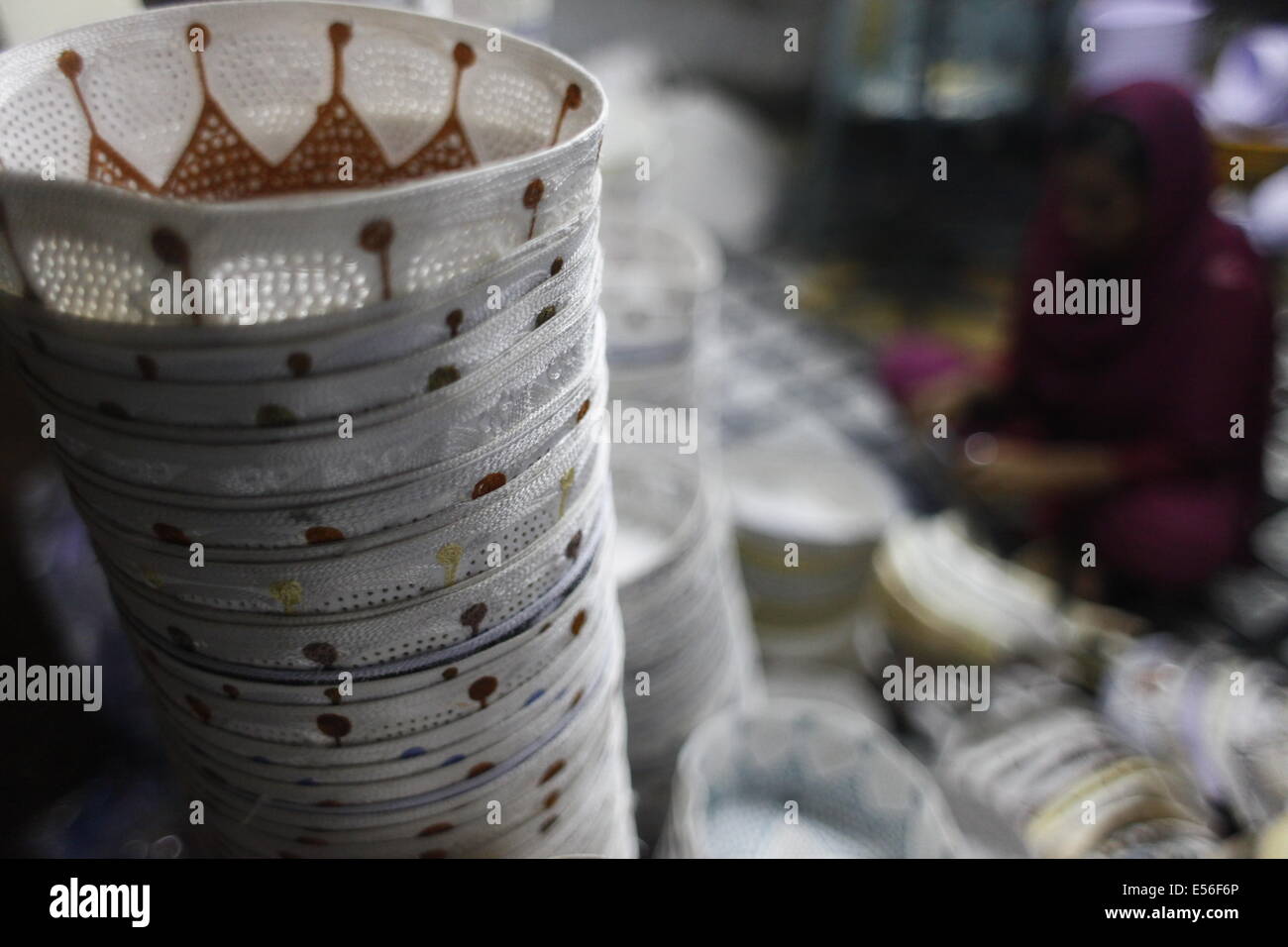 Worker making Islamic Tupi (cap) in a factory in Bangladesh on the ...