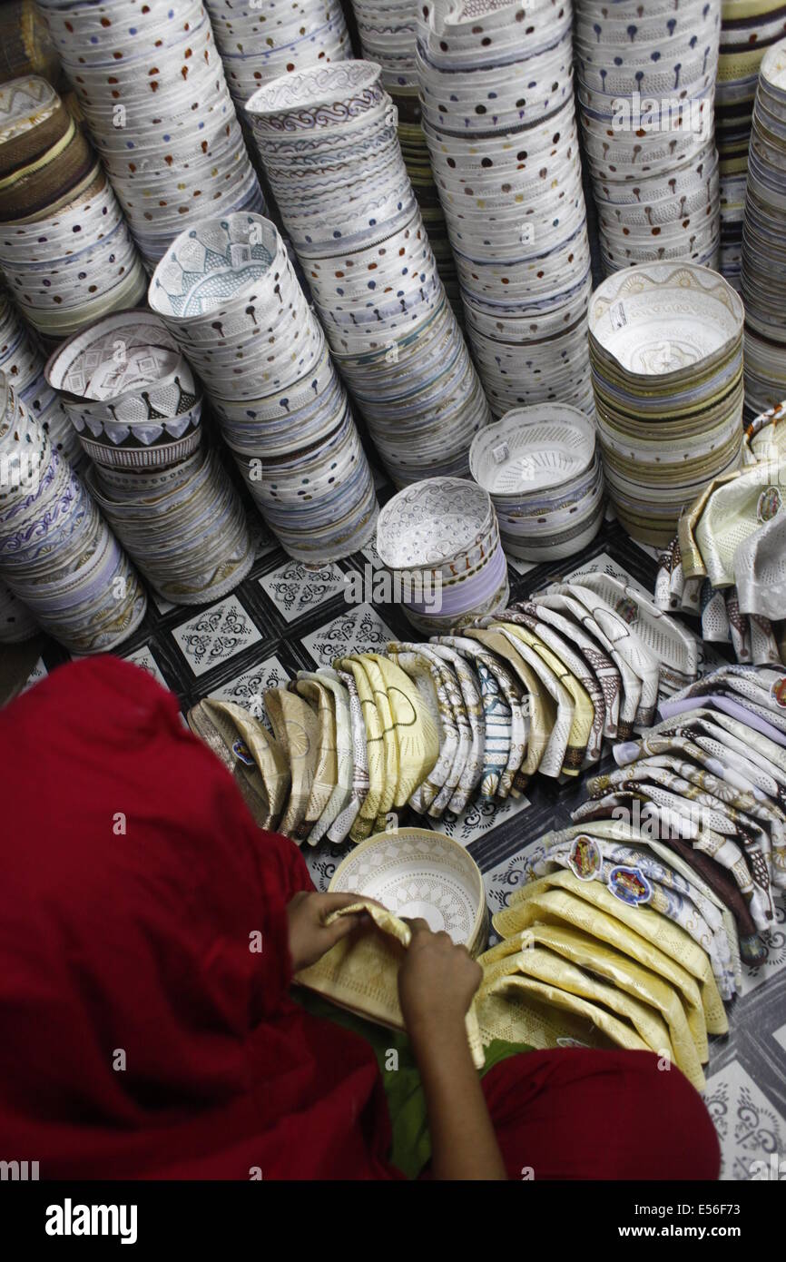 Worker making Islamic Tupi (cap) in a factory in Bangladesh on the ...