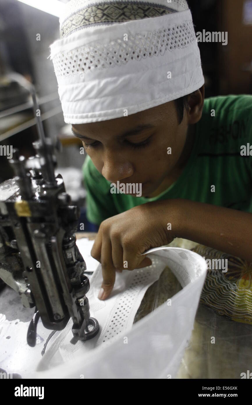 Worker making Islamic Tupi (cap) in a factory in Bangladesh on the ...