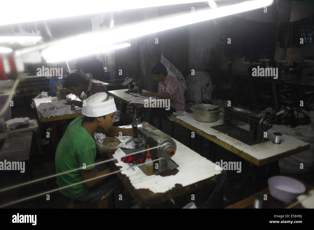 Worker making Islamic Tupi (cap) in a factory in Bangladesh on the ...