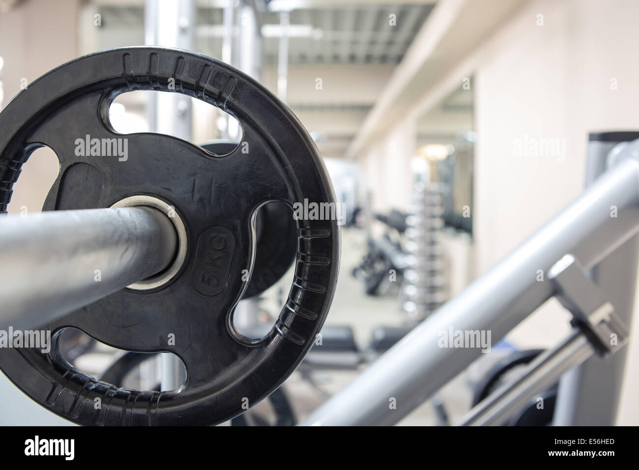 diverse equipment and machines at the gym room Stock Photo - Alamy