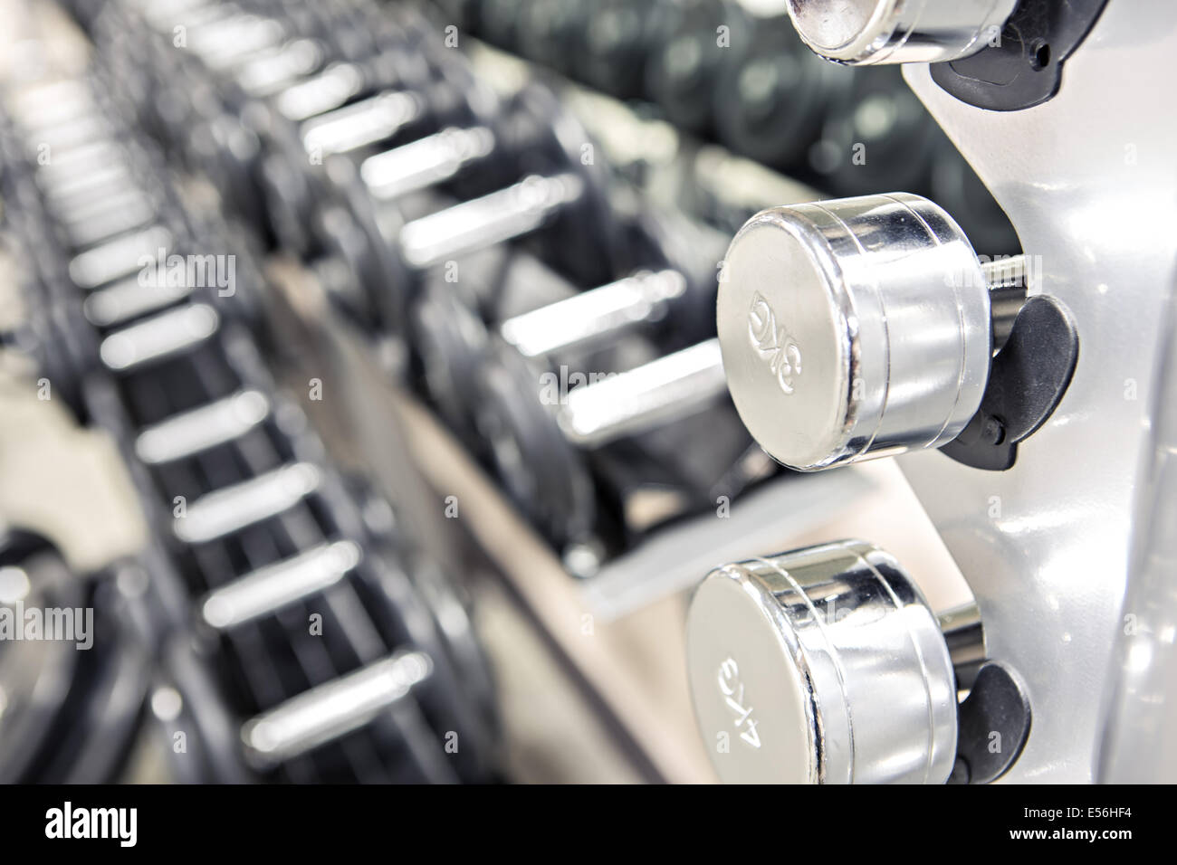 diverse equipment and machines at the gym room Stock Photo - Alamy