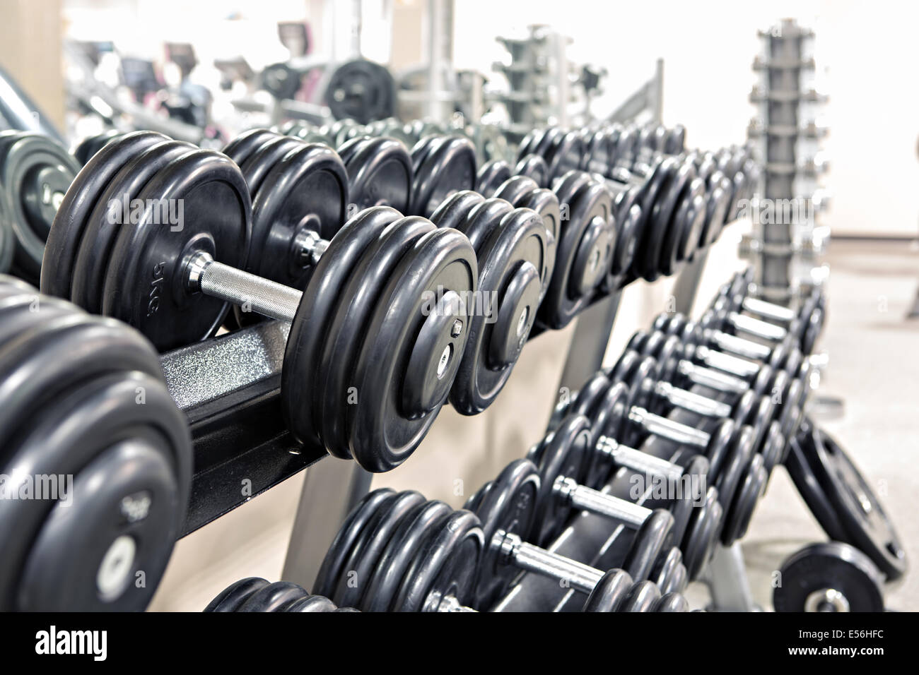 diverse equipment and machines at the gym room Stock Photo - Alamy