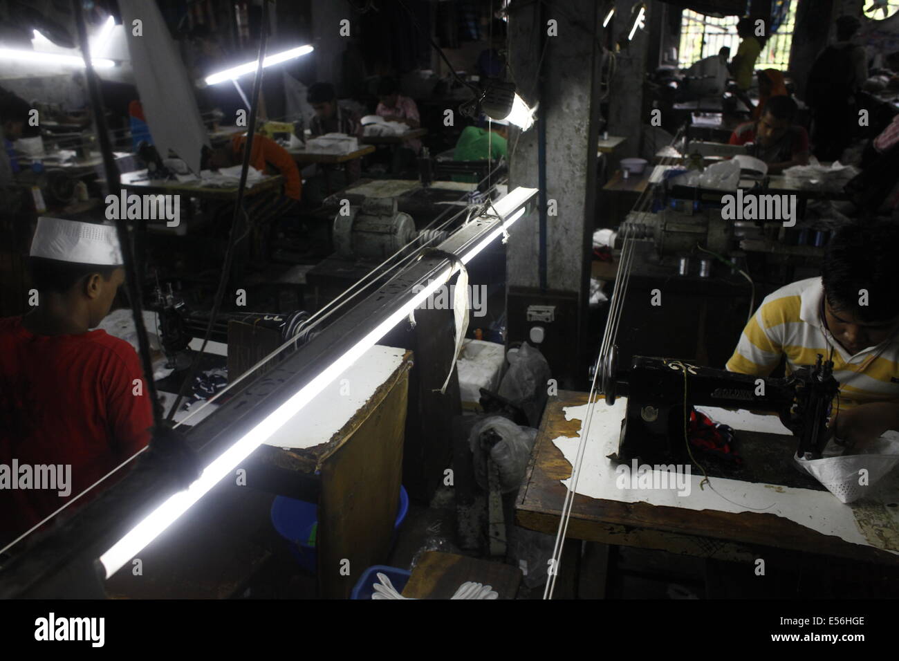 Worker making Islamic Tupi (cap) in a factory in Bangladesh on the ...