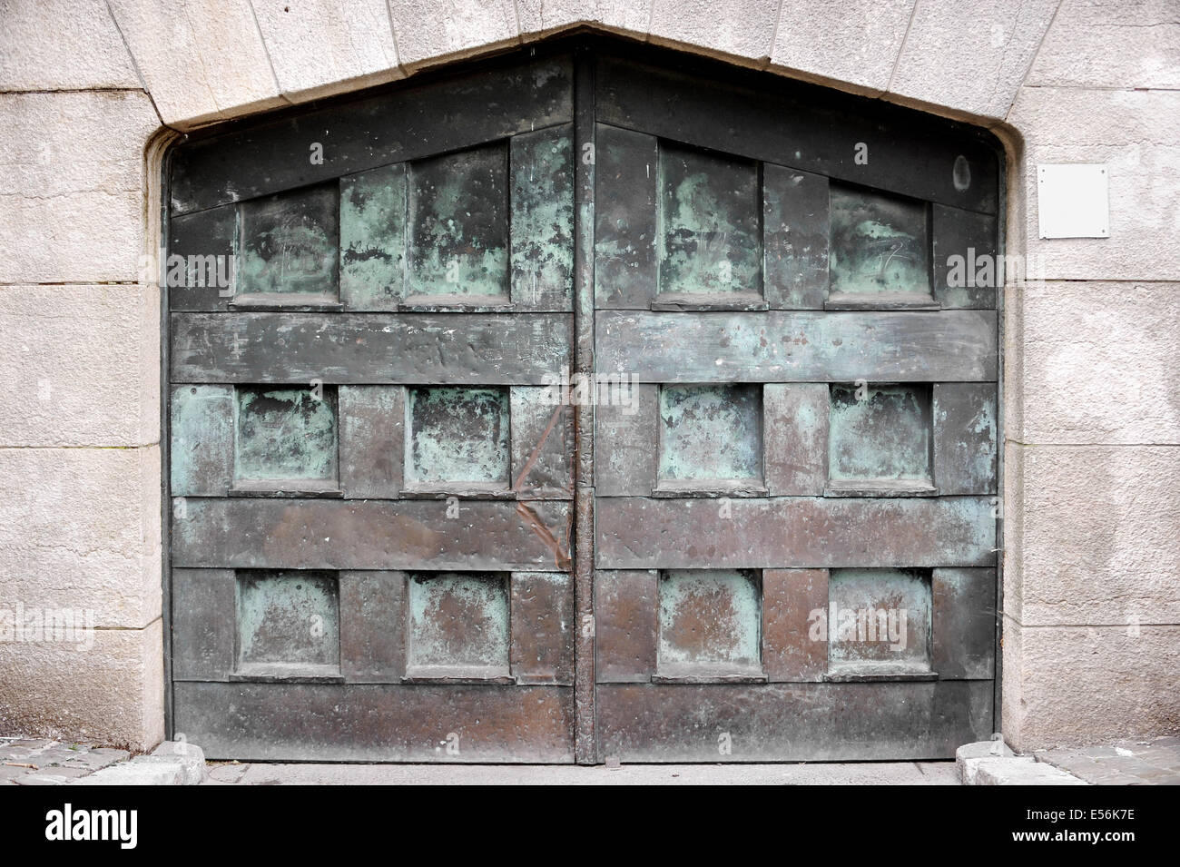 Architecture detail with a locked ancient gate Stock Photo - Alamy