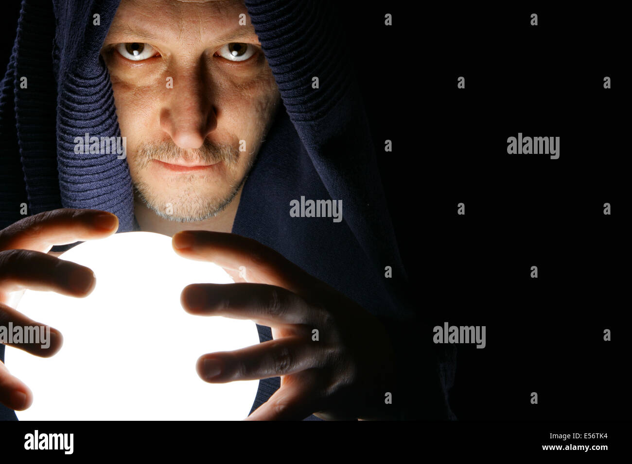 Wizard with glowing magical orb close-up Stock Photo - Alamy