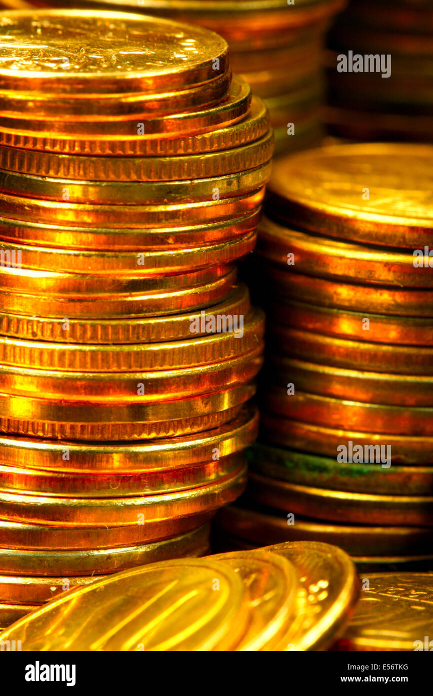 Stacks of the gold coins close up Stock Photo - Alamy