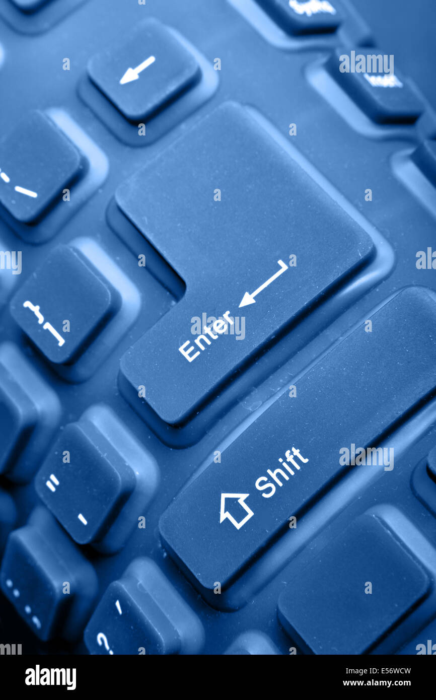 Keyboard close up toned in blue color Stock Photo - Alamy