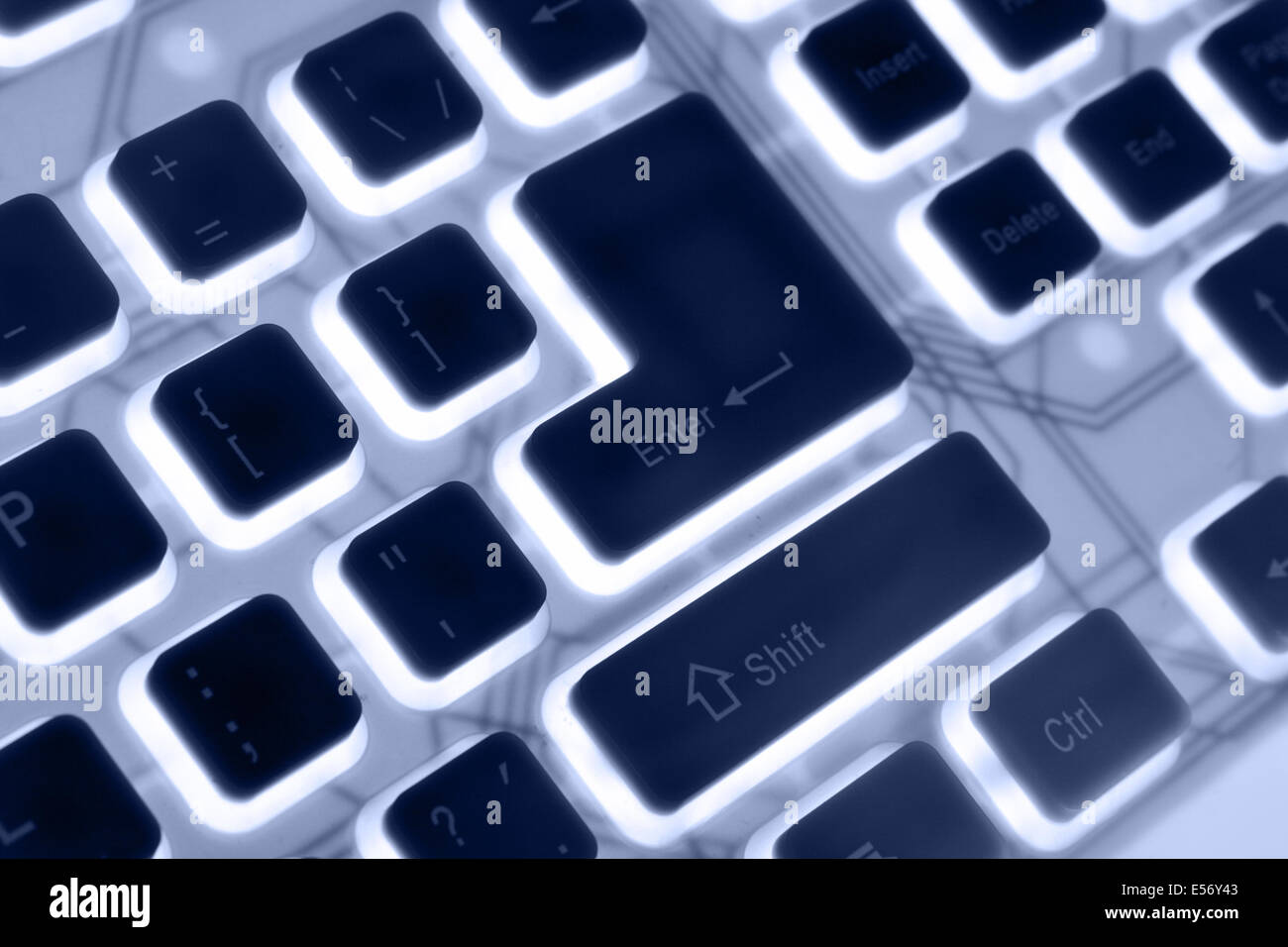 Keyboard close-up toned in blue color Stock Photo - Alamy