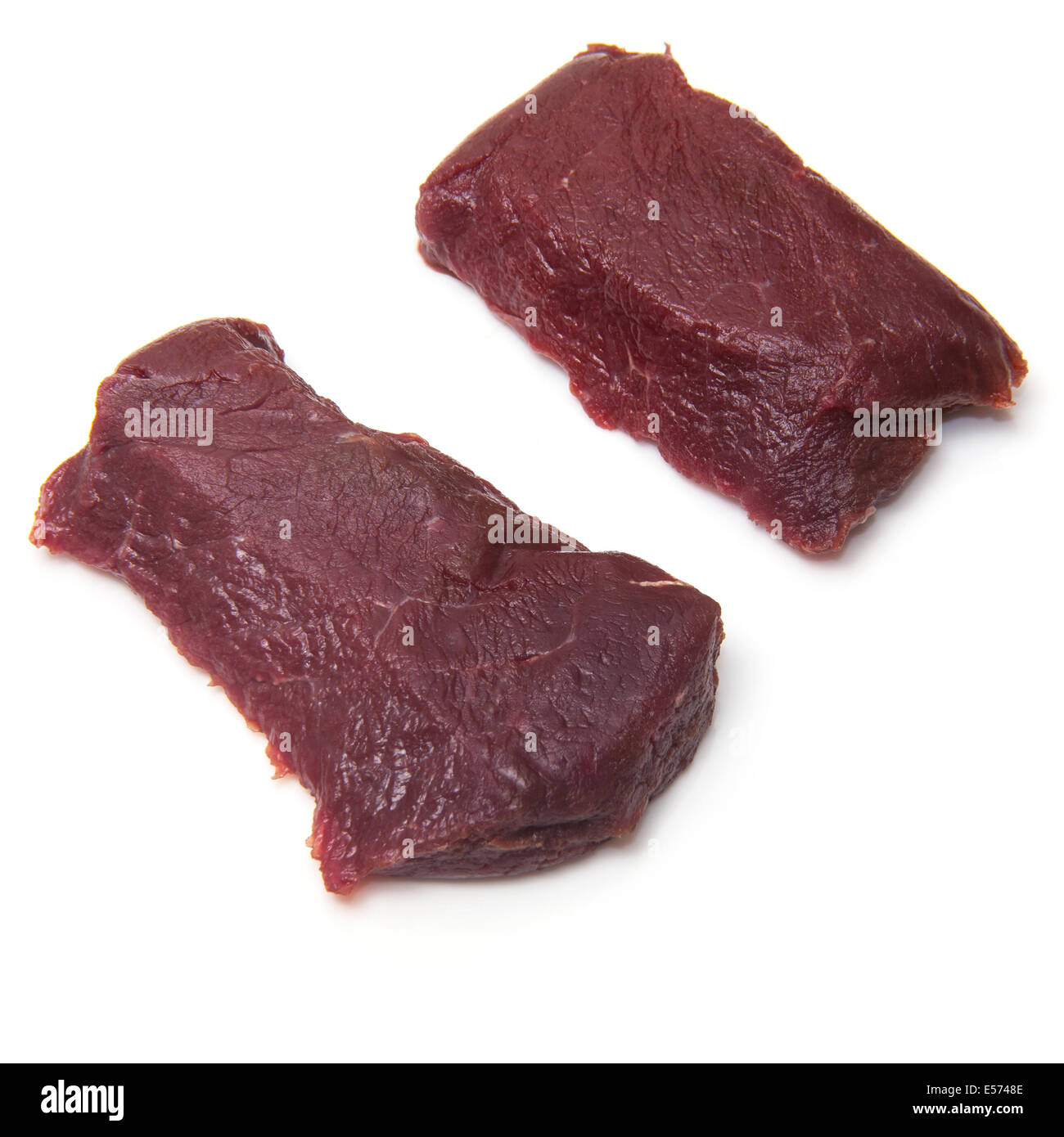 Camel meat steaks uncooked isolated on a white studio background Stock ...
