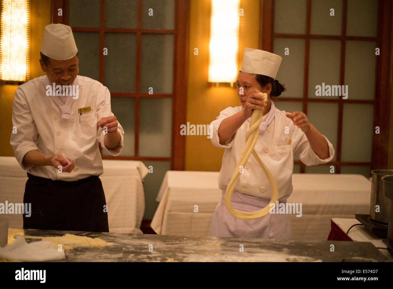 Chinese noodle chefs at banquet, in Beijing, China Stock Photo - Alamy