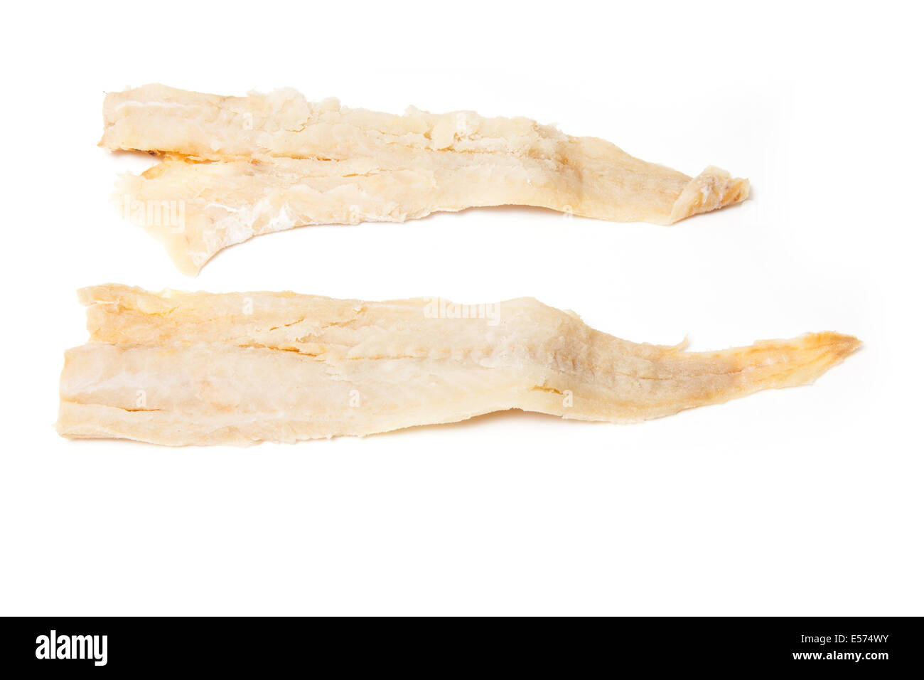 Pieces of salt cod fish isolated on a white studio background Stock ...