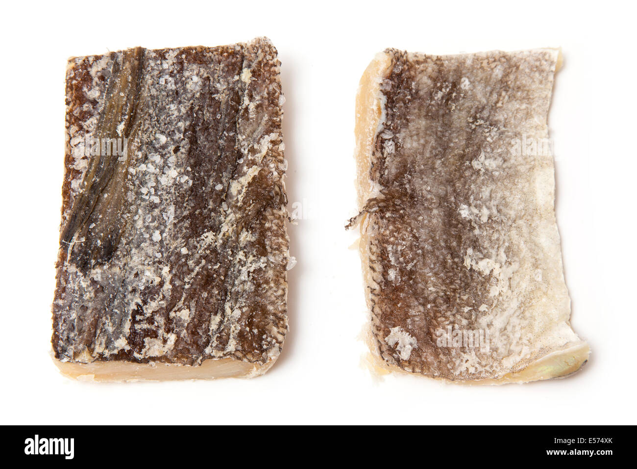 Pieces of salt cod fish isolated on a white studio background Stock ...