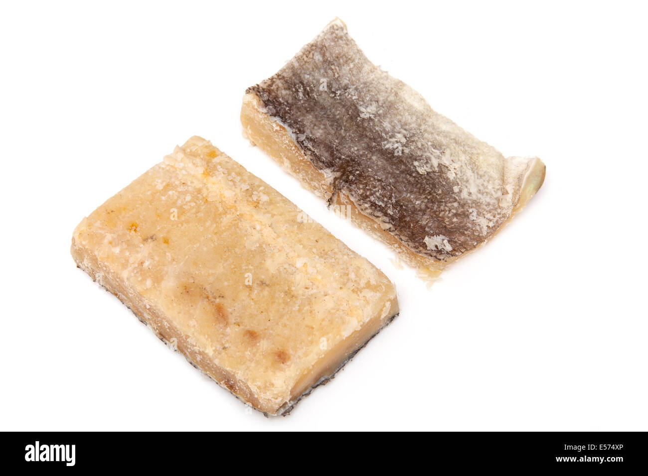 Pieces of salt cod fish isolated on a white studio background Stock ...