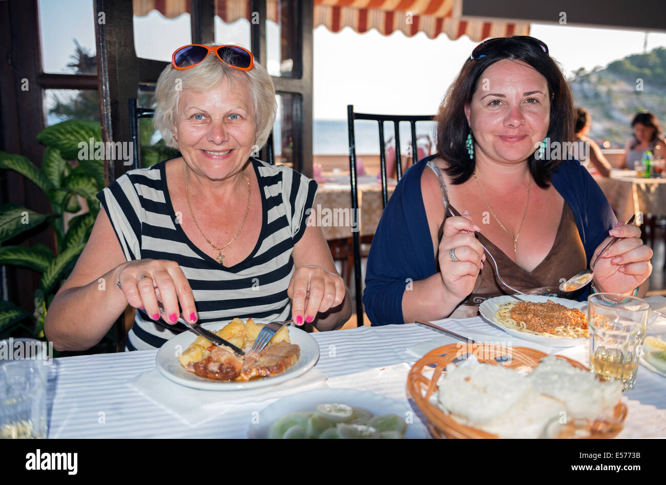 Lady having dinner restaurant hi-res stock photography and images - Alamy