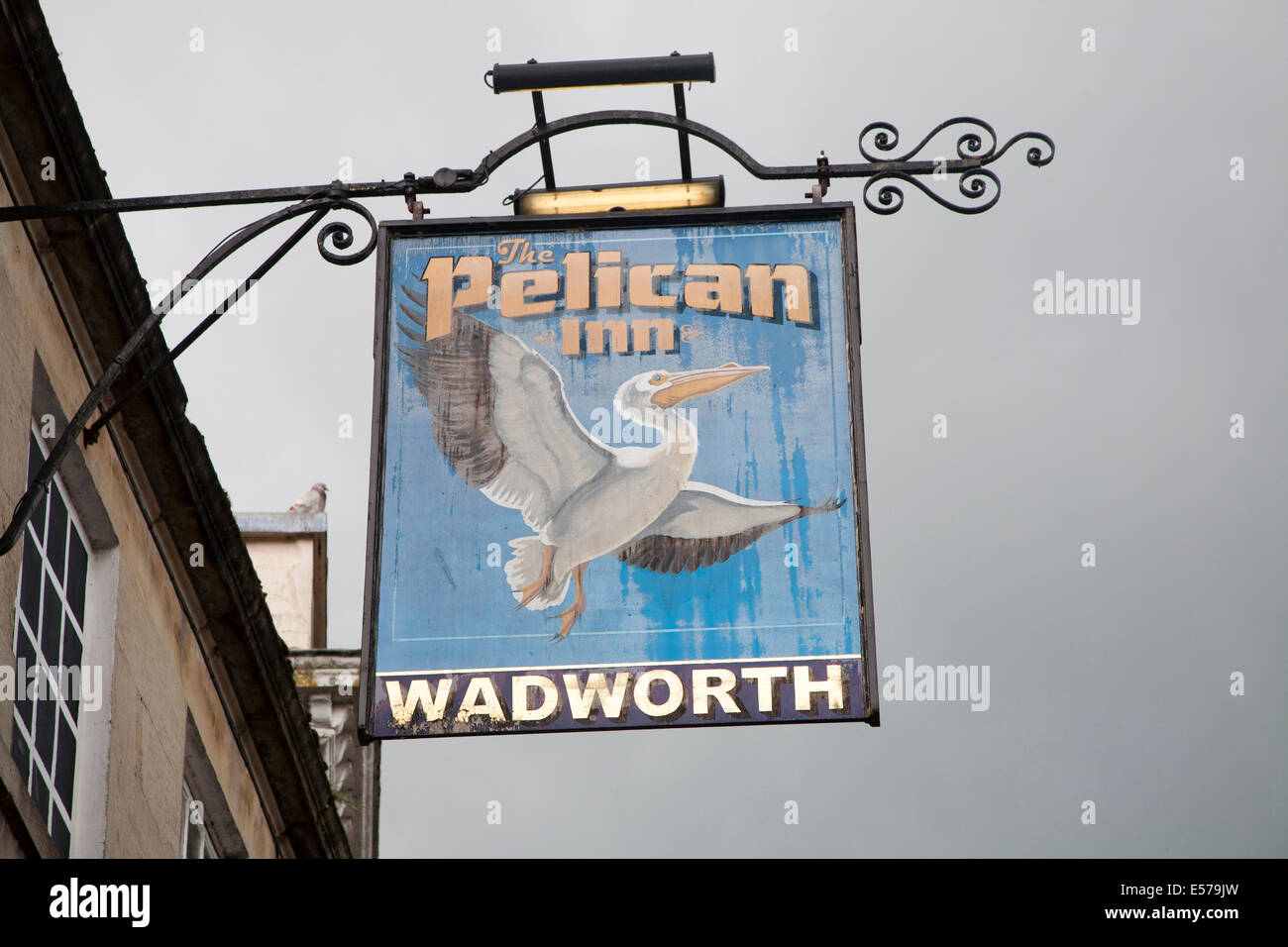 Pub sign for wadworth beer at the pelican inn hi-res stock photography ...