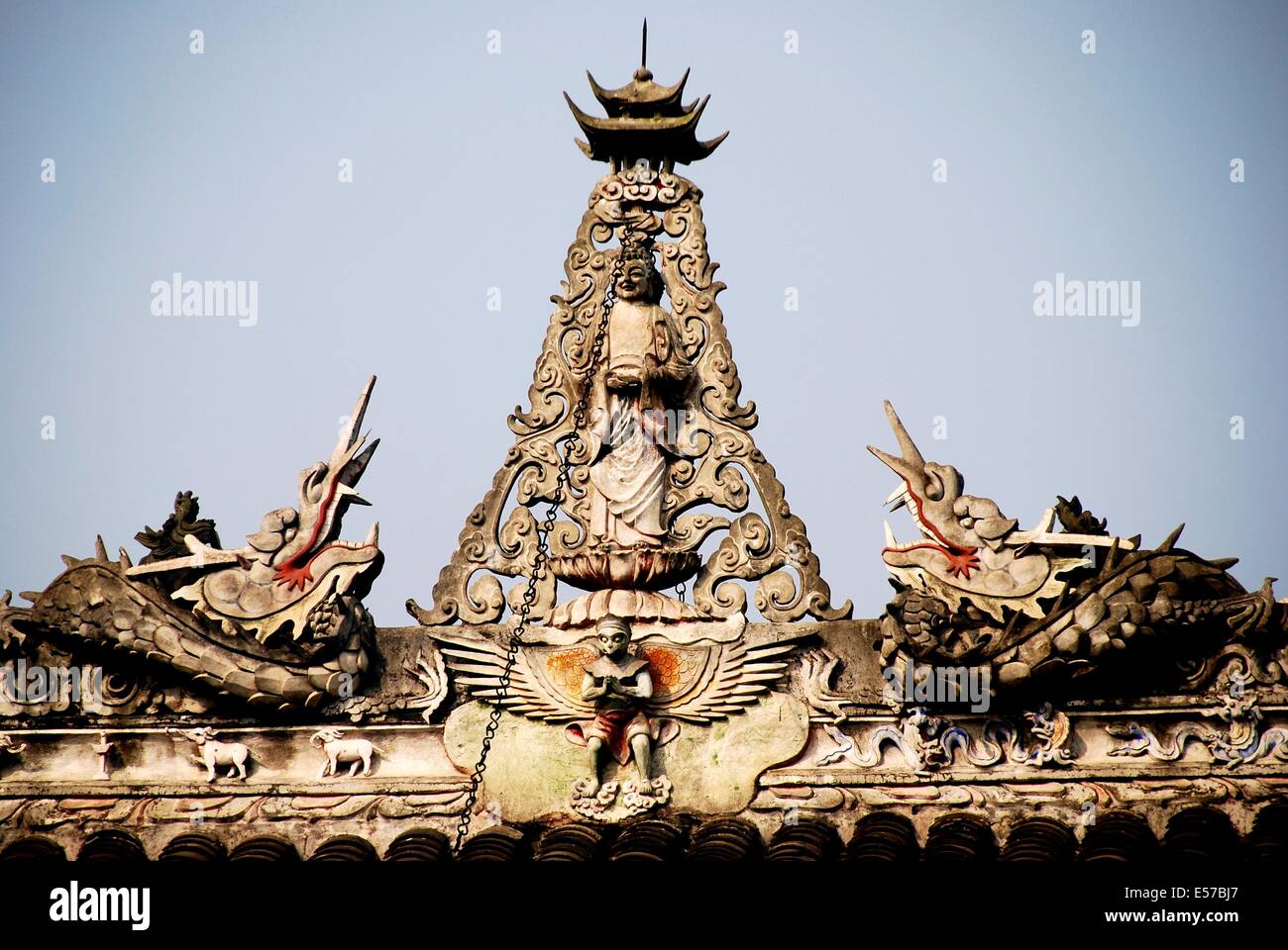 XINDU, CHINA: Double dragons and Buddha figure at the Bao Guang Temple ...