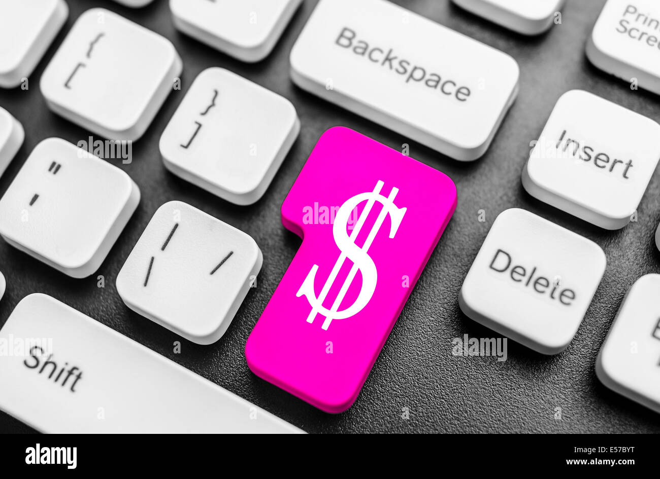 Keyboard with dollar pink button. Concept image Stock Photo - Alamy