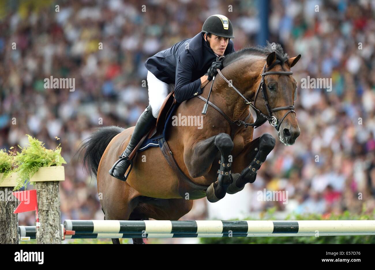 Belgian show jumper Gregory Wathelet in action on his horse Conrad ...