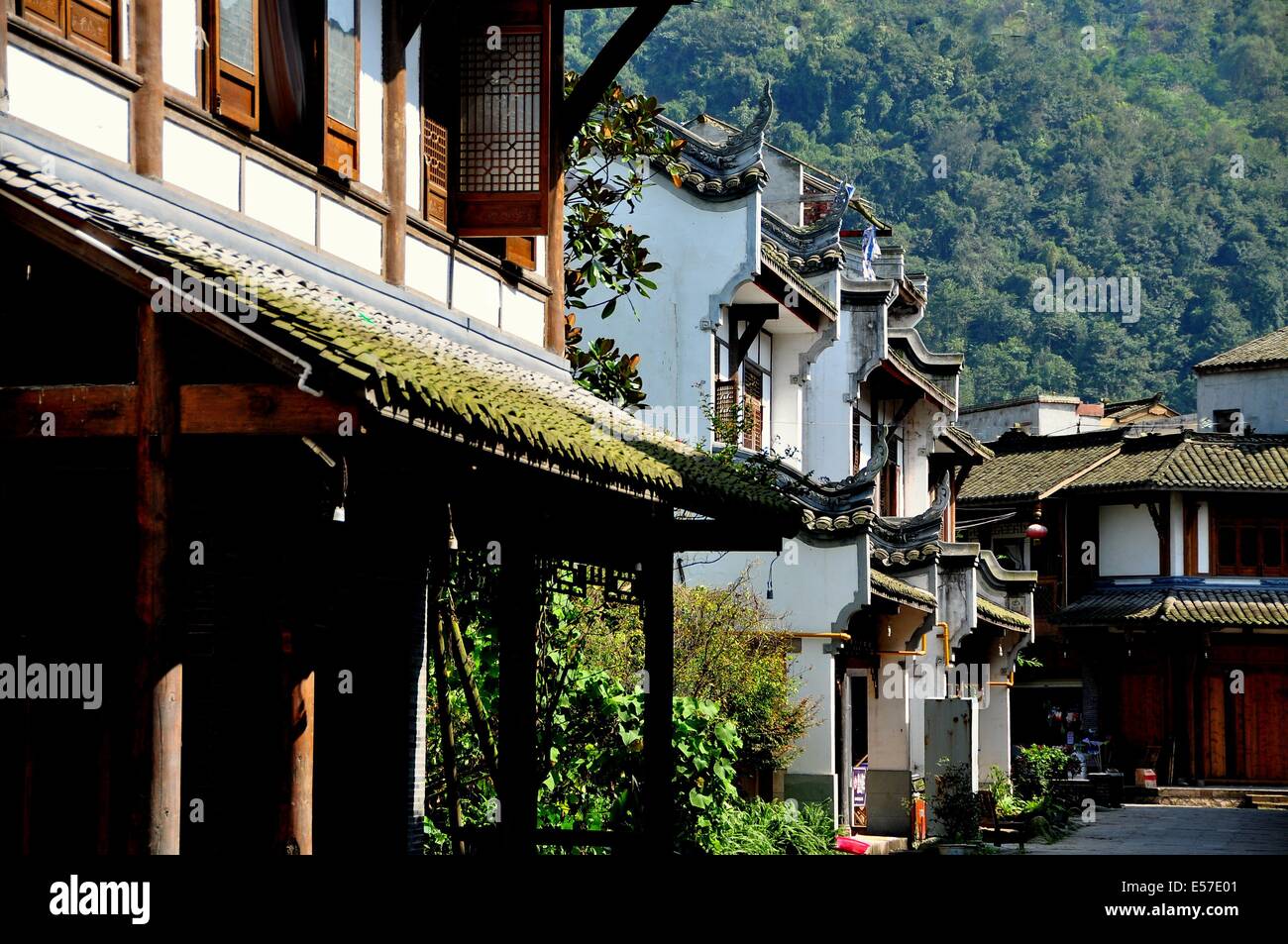 XIN XING TOWN, CHINA: Traditional wooden and stucco buildings with ...