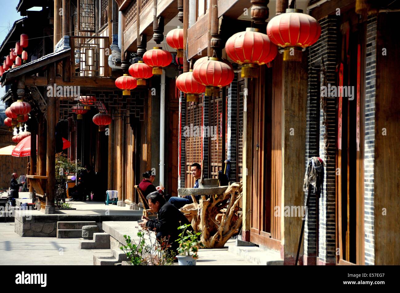 XIN XING ZHEN, CHINA: Sichuan style wooden houses with balconies and ...