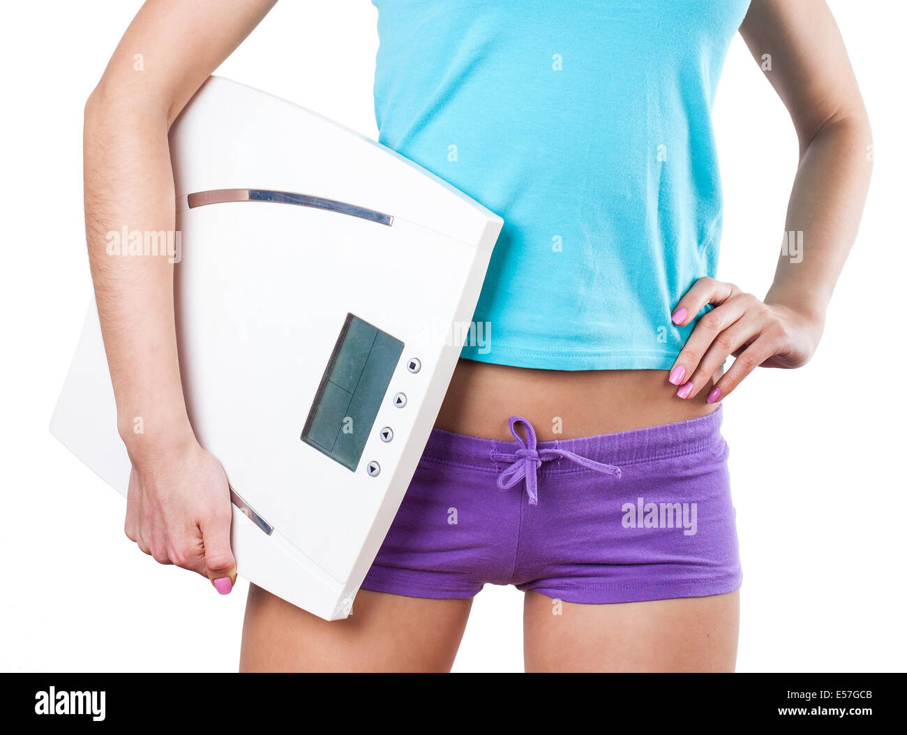 Diet and sport concept - young sporty woman with scale on white Stock ...