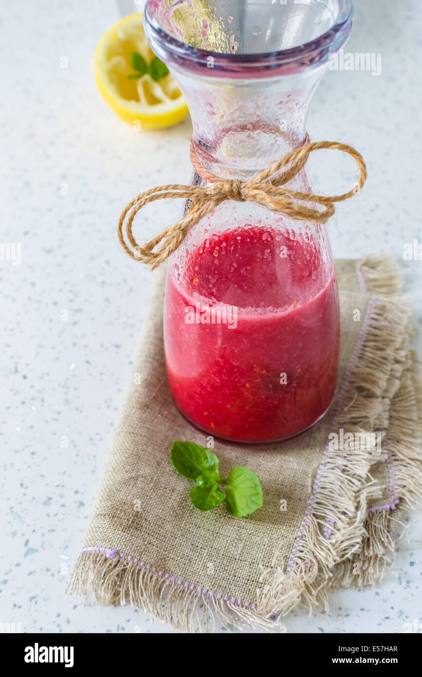 Juice from fresh raspberries with ice drink Stock Photo - Alamy