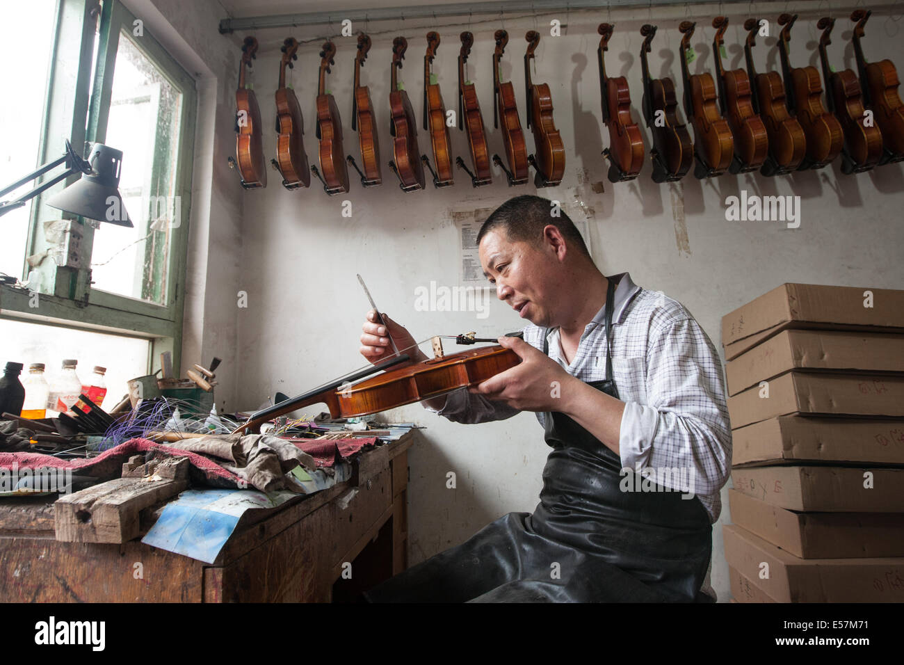 The Beijing Tian Jing Handwork Fiddle Factory, in the Tongzhou district ...