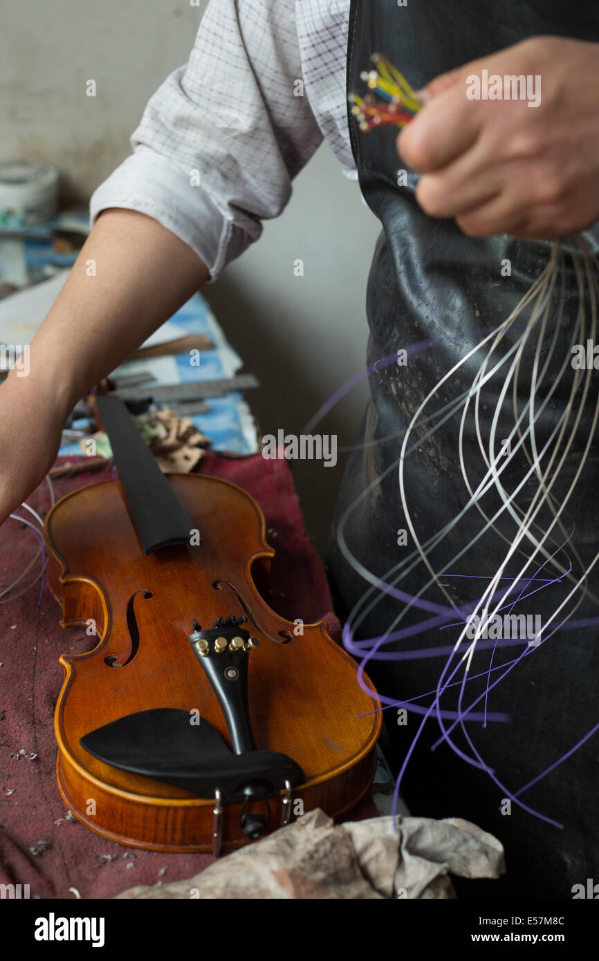 The Beijing Tian Jing Handwork Fiddle Factory, in the Tongzhou district ...