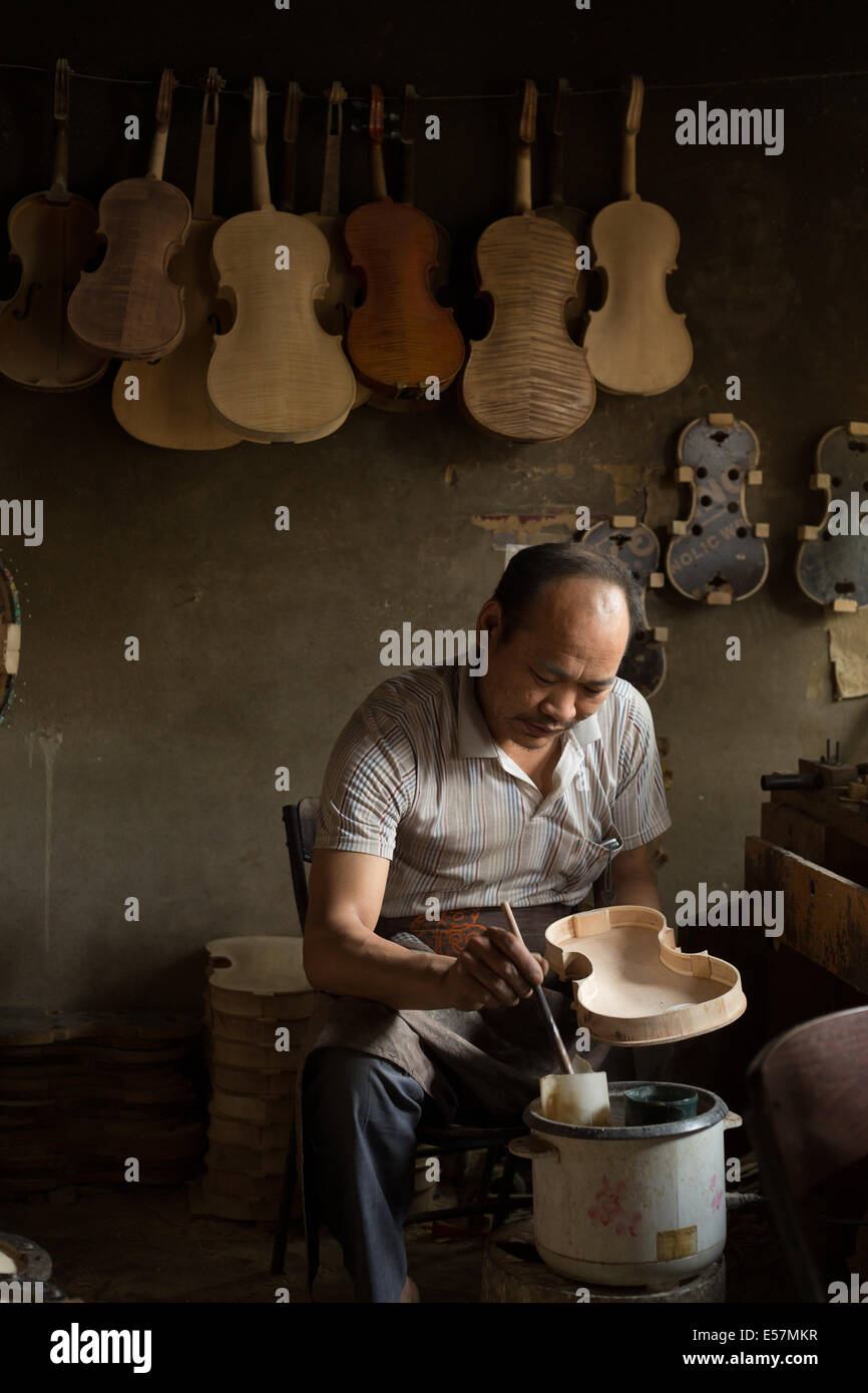 The Beijing Tian Jing Handwork Fiddle Factory, in the Tongzhou district ...