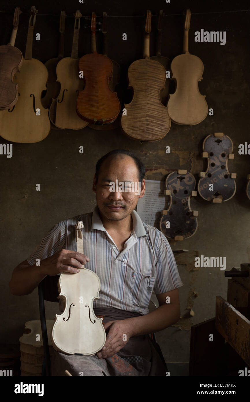 The Beijing Tian Jing Handwork Fiddle Factory, in the Tongzhou district ...