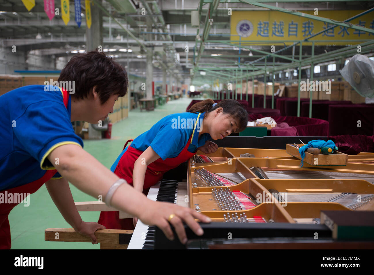 Manufacturing musical instruments hi-res stock photography and images ...