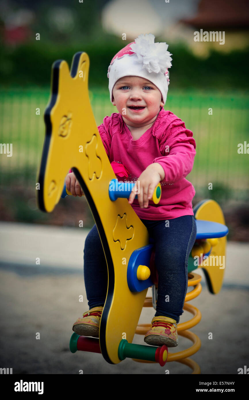Playground with rocking horse hi-res stock photography and images - Alamy