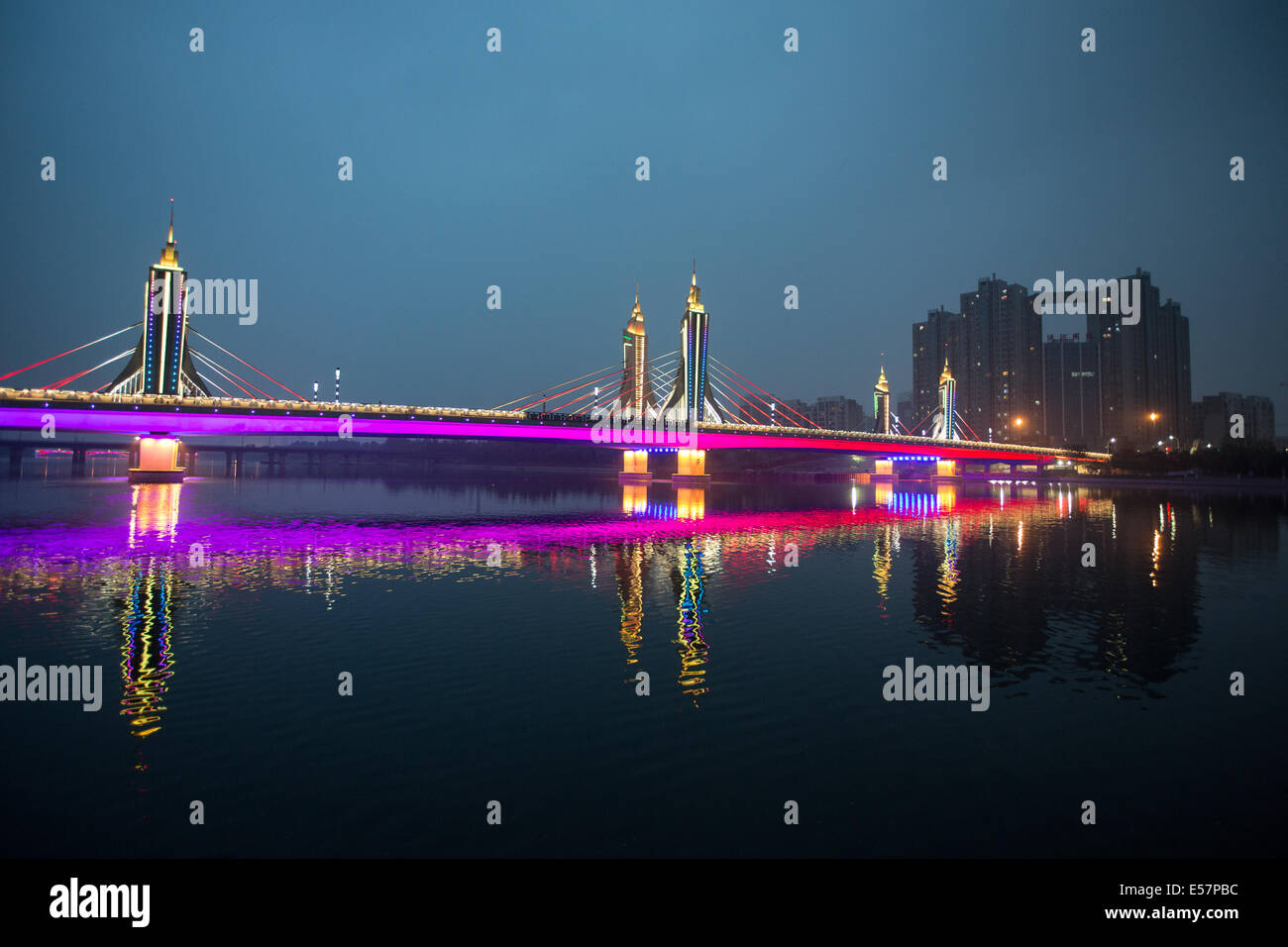The Jade Belt Road Bridge, illuminated at night, over the Grand Canal ...