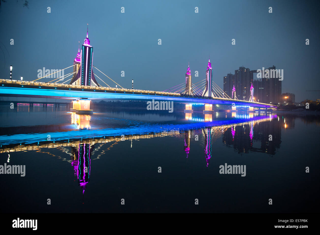 The Jade Belt Road Bridge, illuminated at night, over the Grand Canal ...