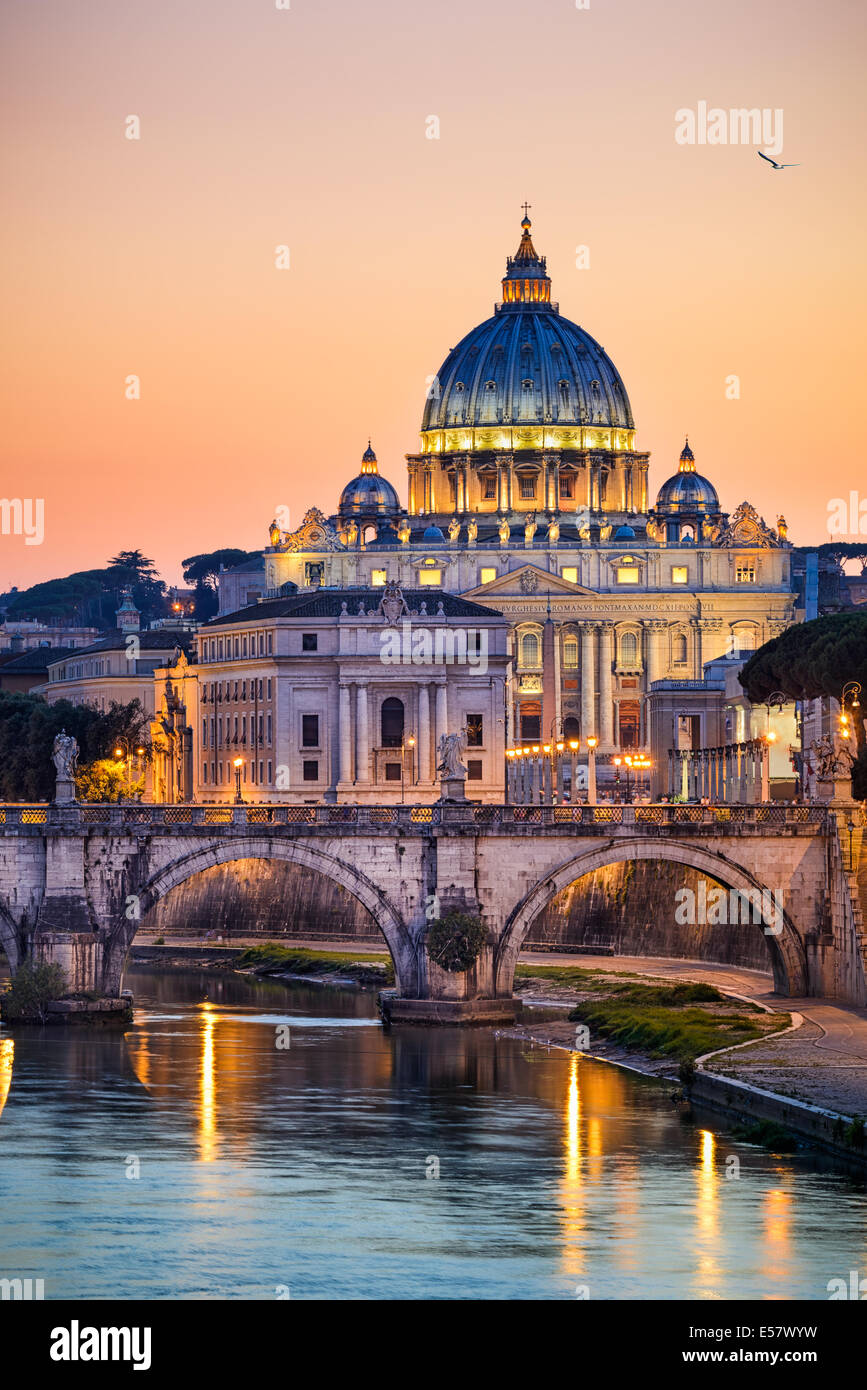 Night view of the Basilica St Peter and the Tiber river in Rome, Italy ...