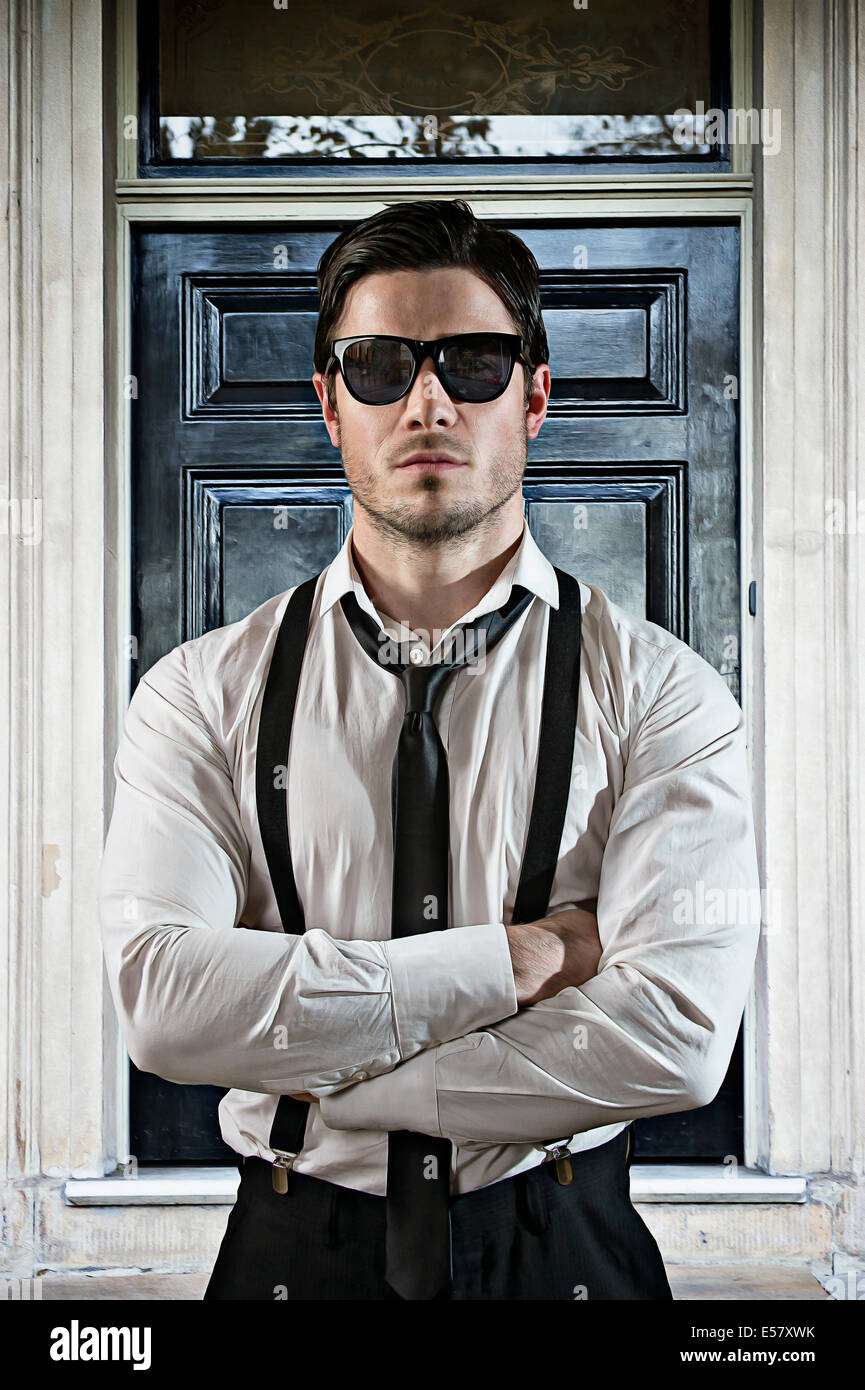 Security guard protects the door of as club Stock Photo - Alamy