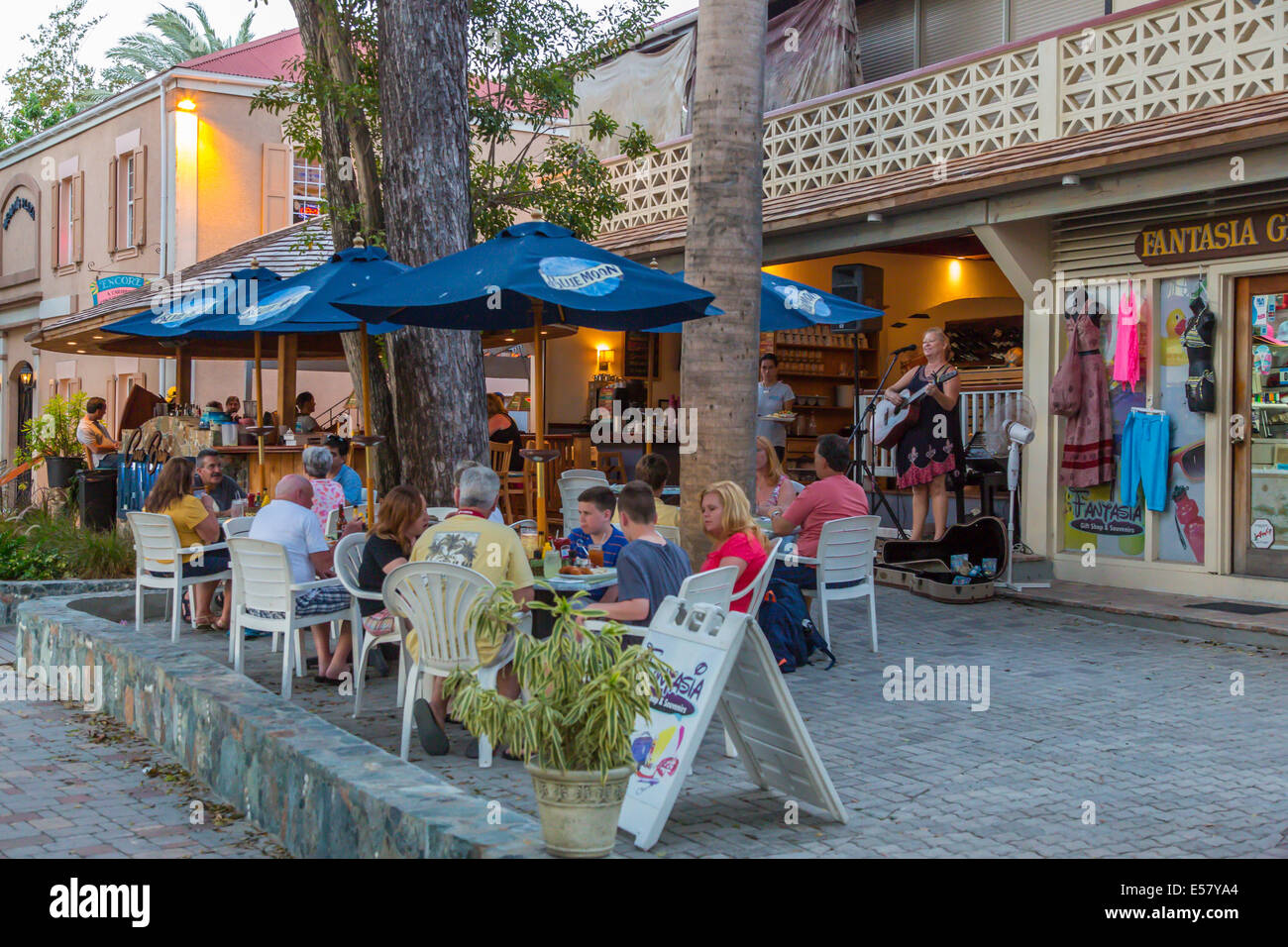 People at outdoor Cruz Bay Landing restaurant and bar in Cruz Bay on ...