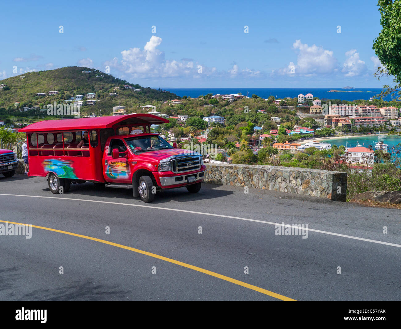Tourist taxi at overlook of Cruz Bay on the Caribbean Island of St John ...